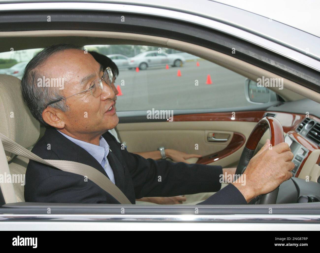 Toyota Motor Corp. President Katsuaki Watanabe speaks to a reporter ...