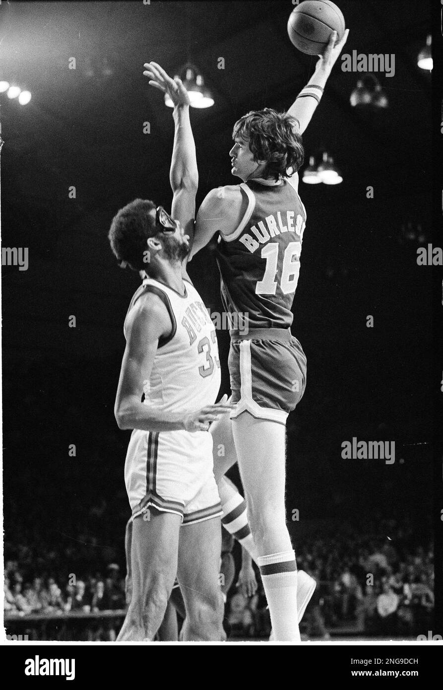 Seattle Supersonics' tall rookie center, Tommy Burleson, (16) jumps and ...