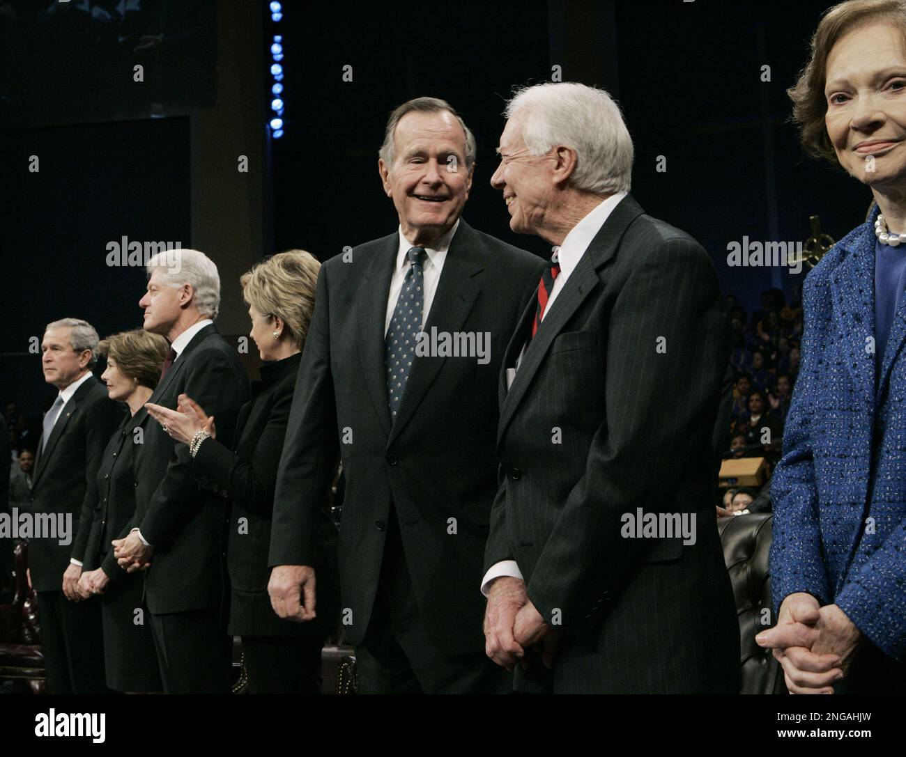 Former President George H.W. Bush, left, talks with former President ...