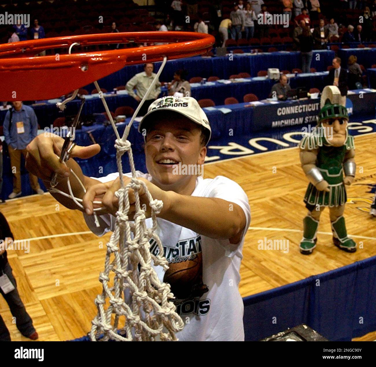 Michigan State guard Kristin Haynie cuts the net after her team beat ...