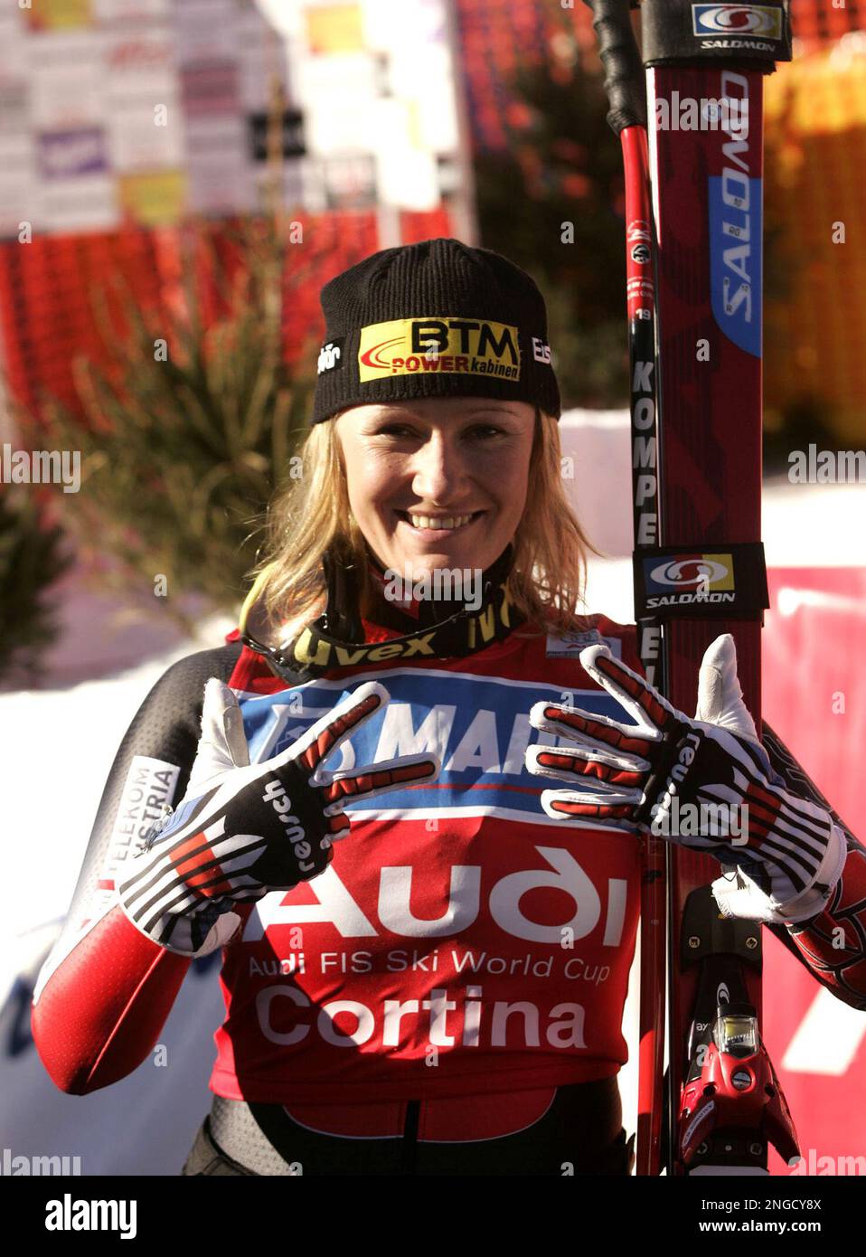 Renate Goetschl of Austria indicates eight, referring to her eight ...