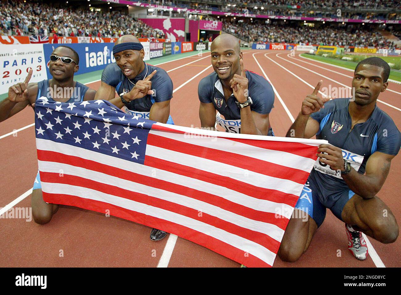** FILE ** U.S. relay team Jerome Young, Tyree Washington, Calvin ...