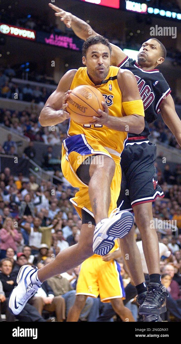 ** FILE ** Los Angeles Lakers' Rick Fox goes up for a shot as Chicago ...