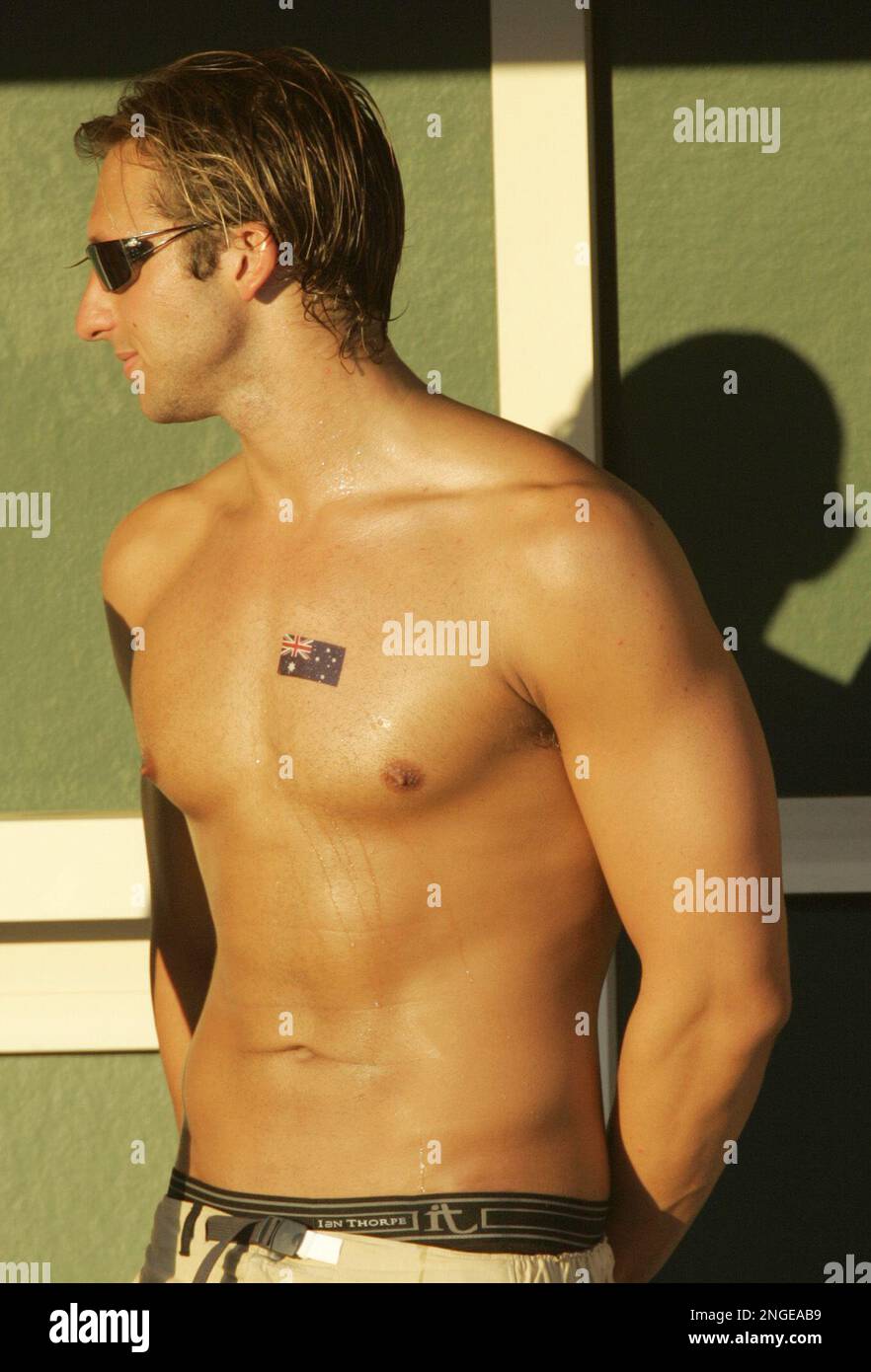 Ian Thorpe, of Australia, waits in the stands to cheer compatriot Brett ...