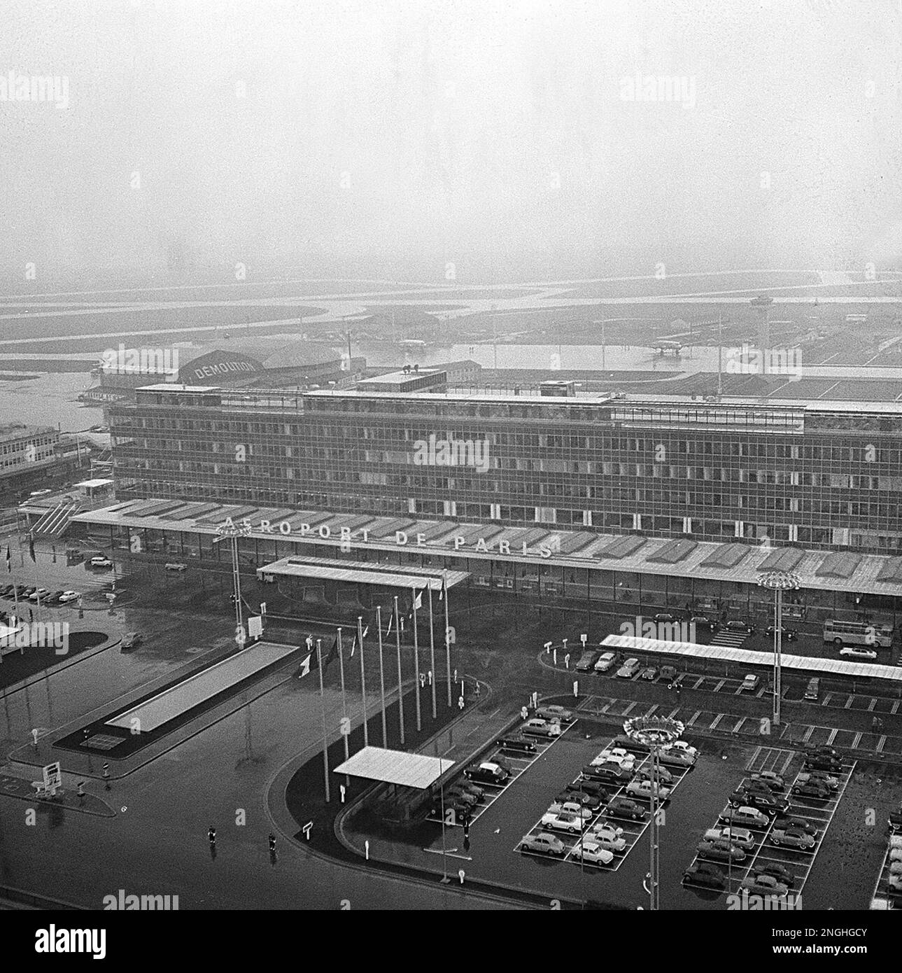 This aerial view shows Orly airfield's new glass-walled passenger ...