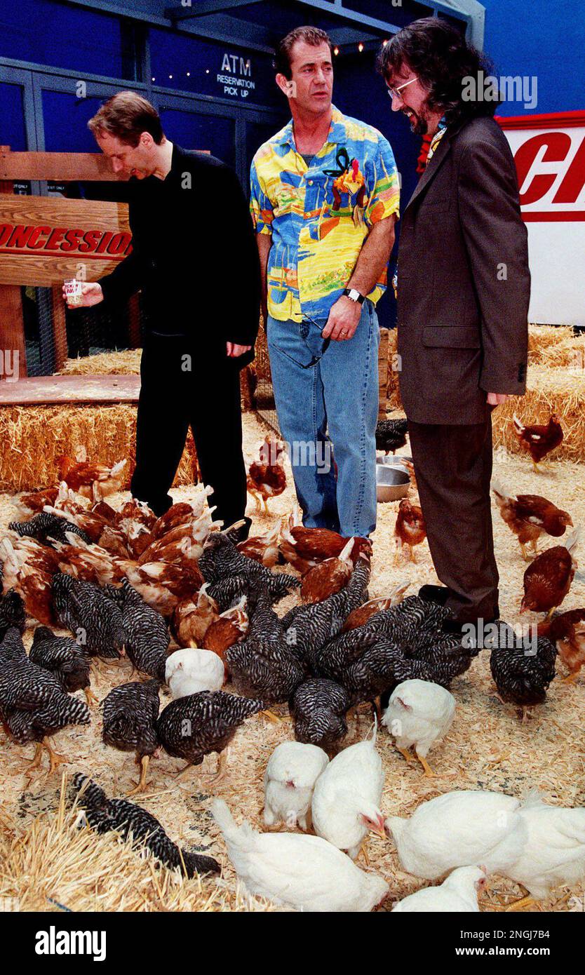 Mel Gibson, center, who stars as the voice of Rocky the Rooster in the ...