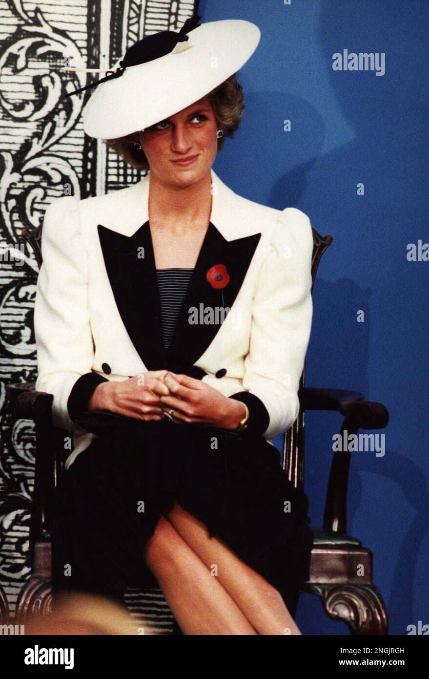 Diana, the Princes of Wales, casts a glance at her husband Prince ...
