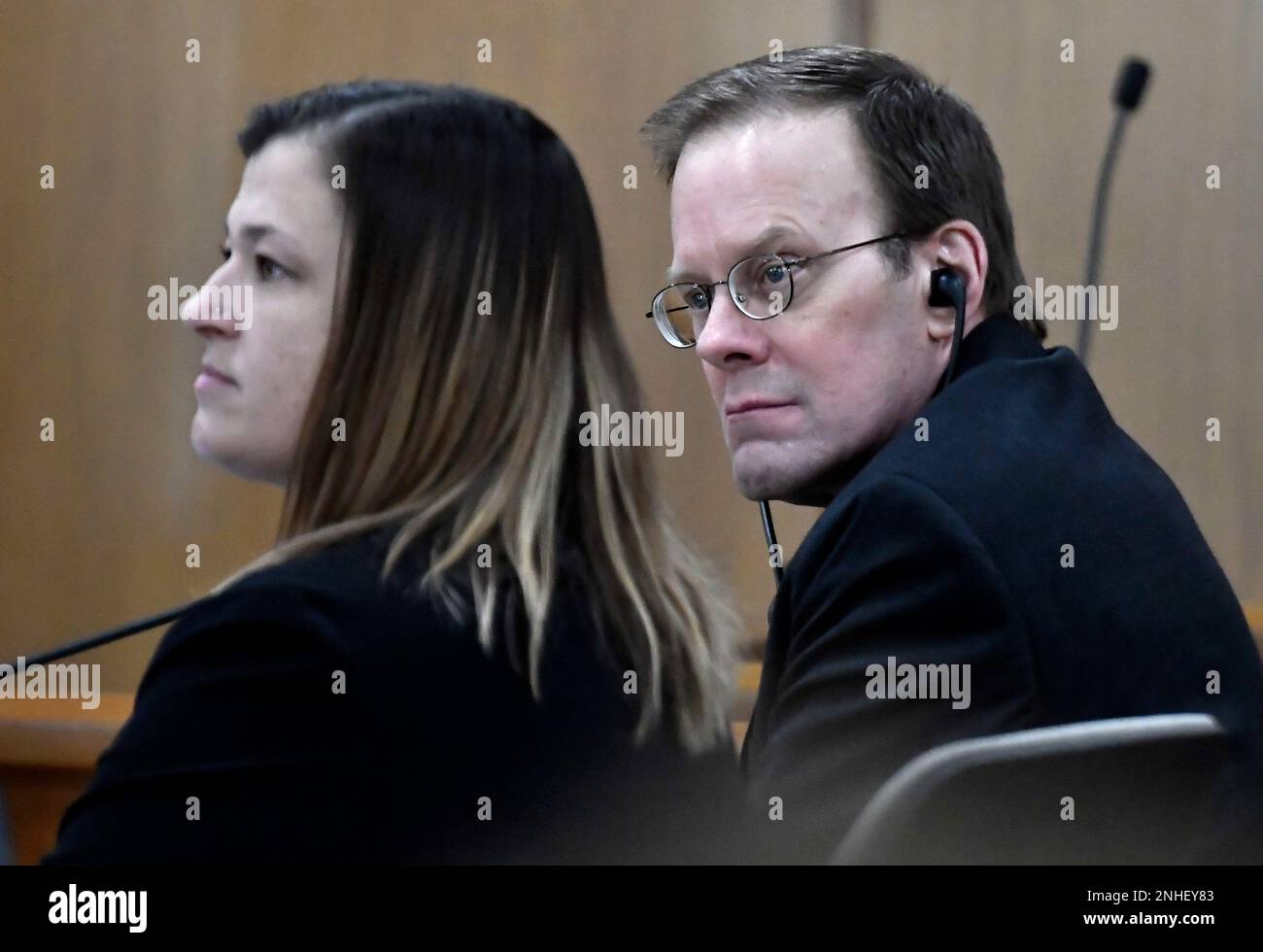 Mark Jensen, right, and one of his attorneys, Mackenzie Renner, listen ...