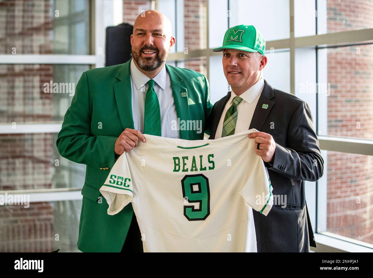 Marshall athletic director Christian Spears, left, introduces Greg ...