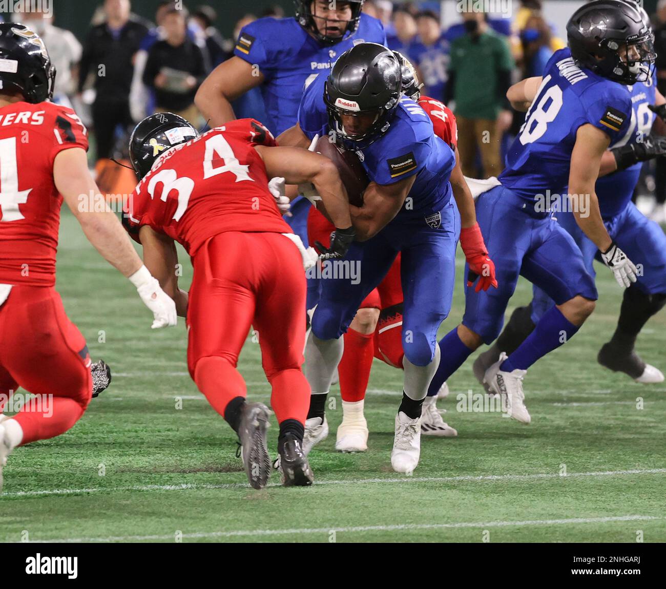 Victor Jamal Mitchell Jr (RB. front) of Panasonic Impulse scores a ...