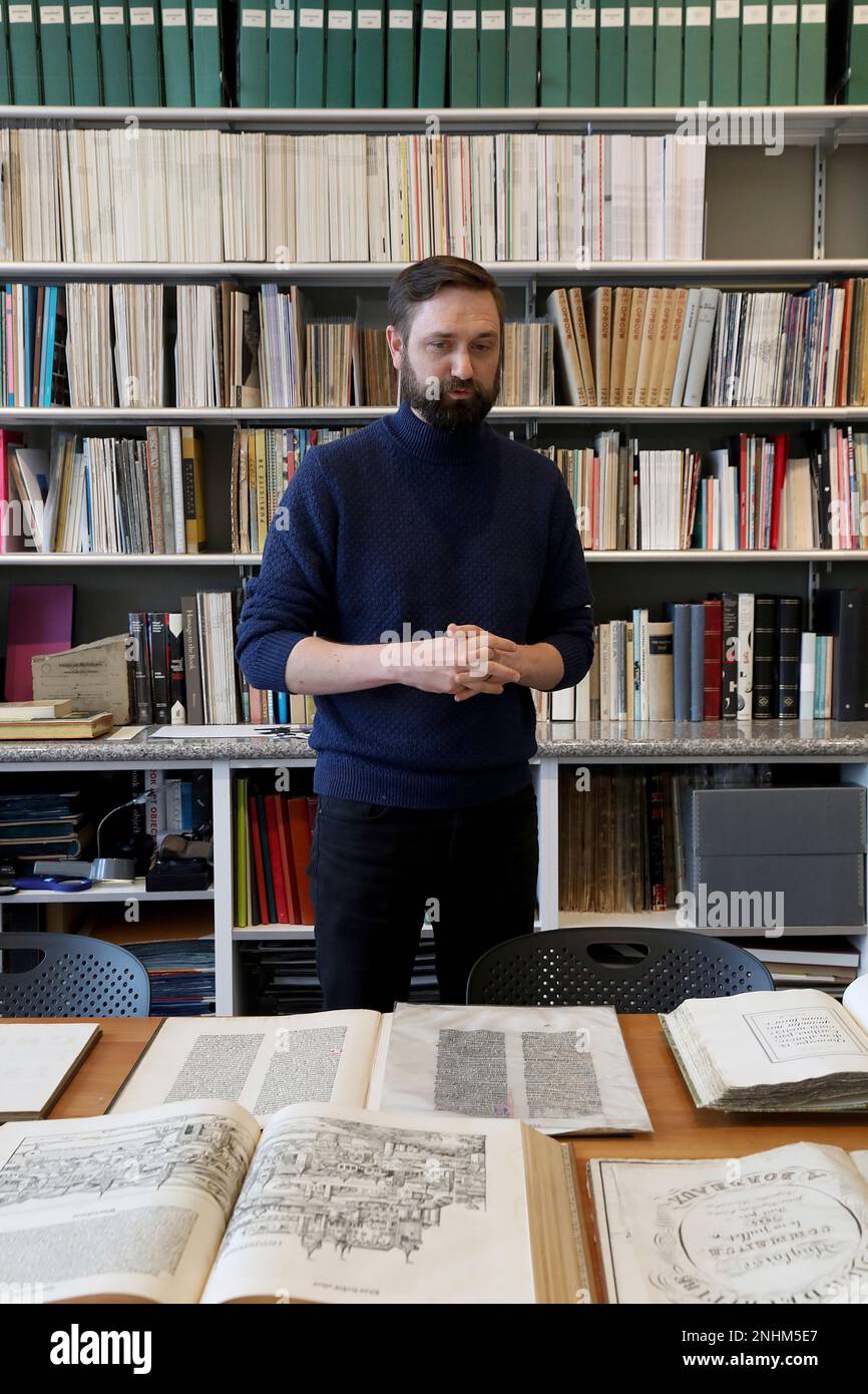 Associate curator and editorial director Stephen Coles shows the Letterform Archive library on ...