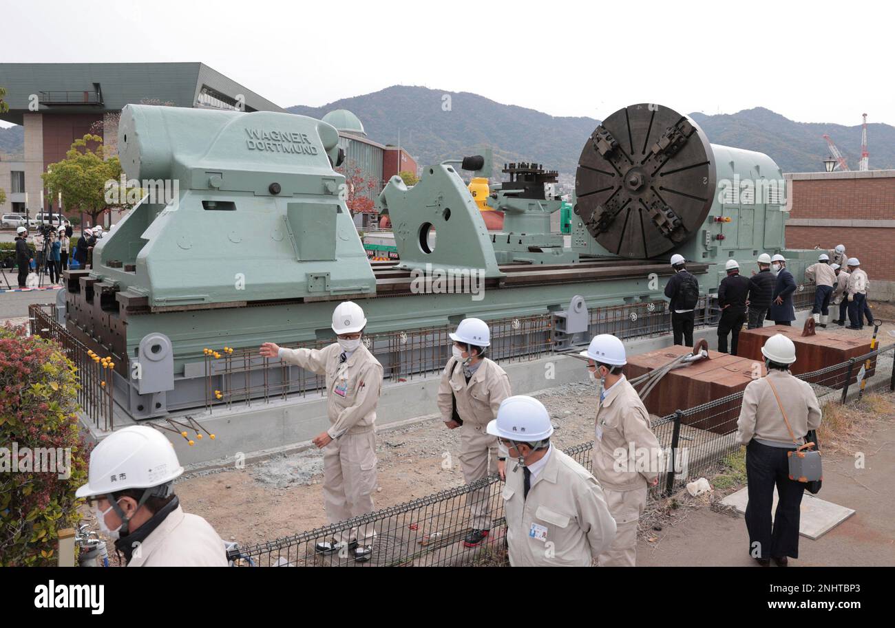 A huge lathe is transported to the Yamato Museum in Kure, Hiroshima ...
