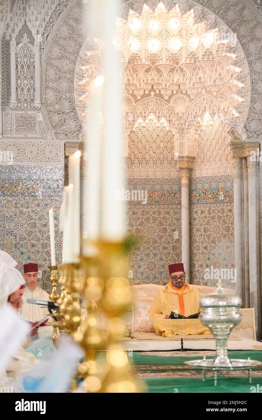 In this photo released by the Royal Palace, Morocco's King Mohammed VI right, accompanied by the ...