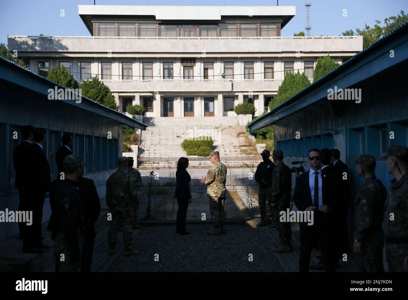U.S. Vice President Kamala Harris, center left, stands next to the ...