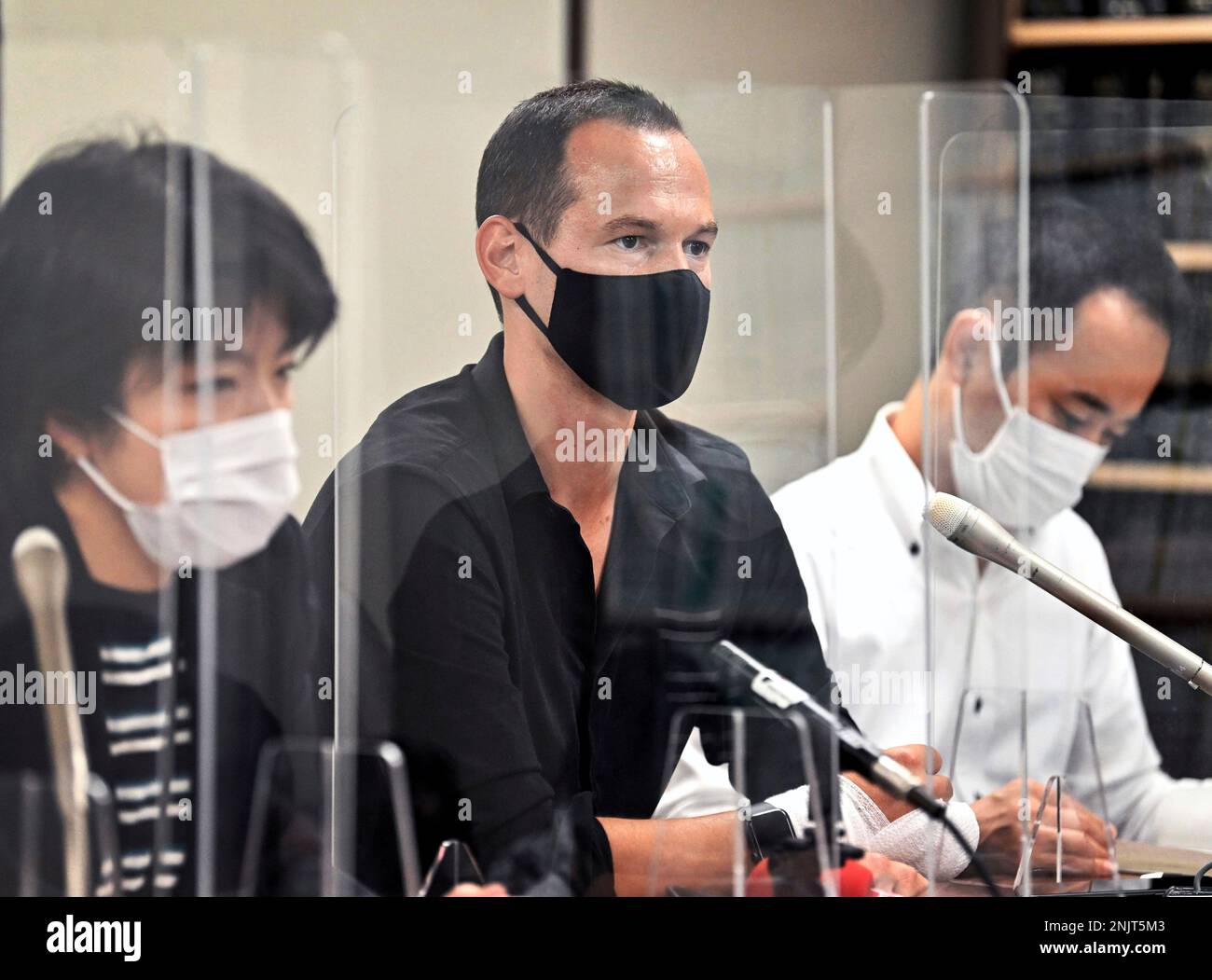 Vincent Fichot of France (C) attends a press conference after decision ...