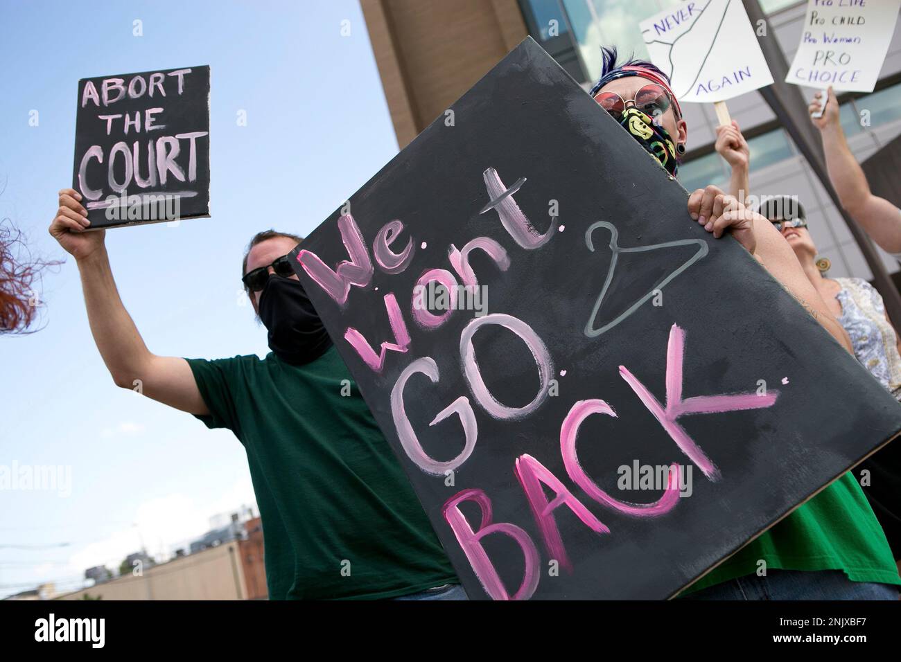 Charlie Wayne, left, Jasper Nieves and other demonstrators advocate for ...