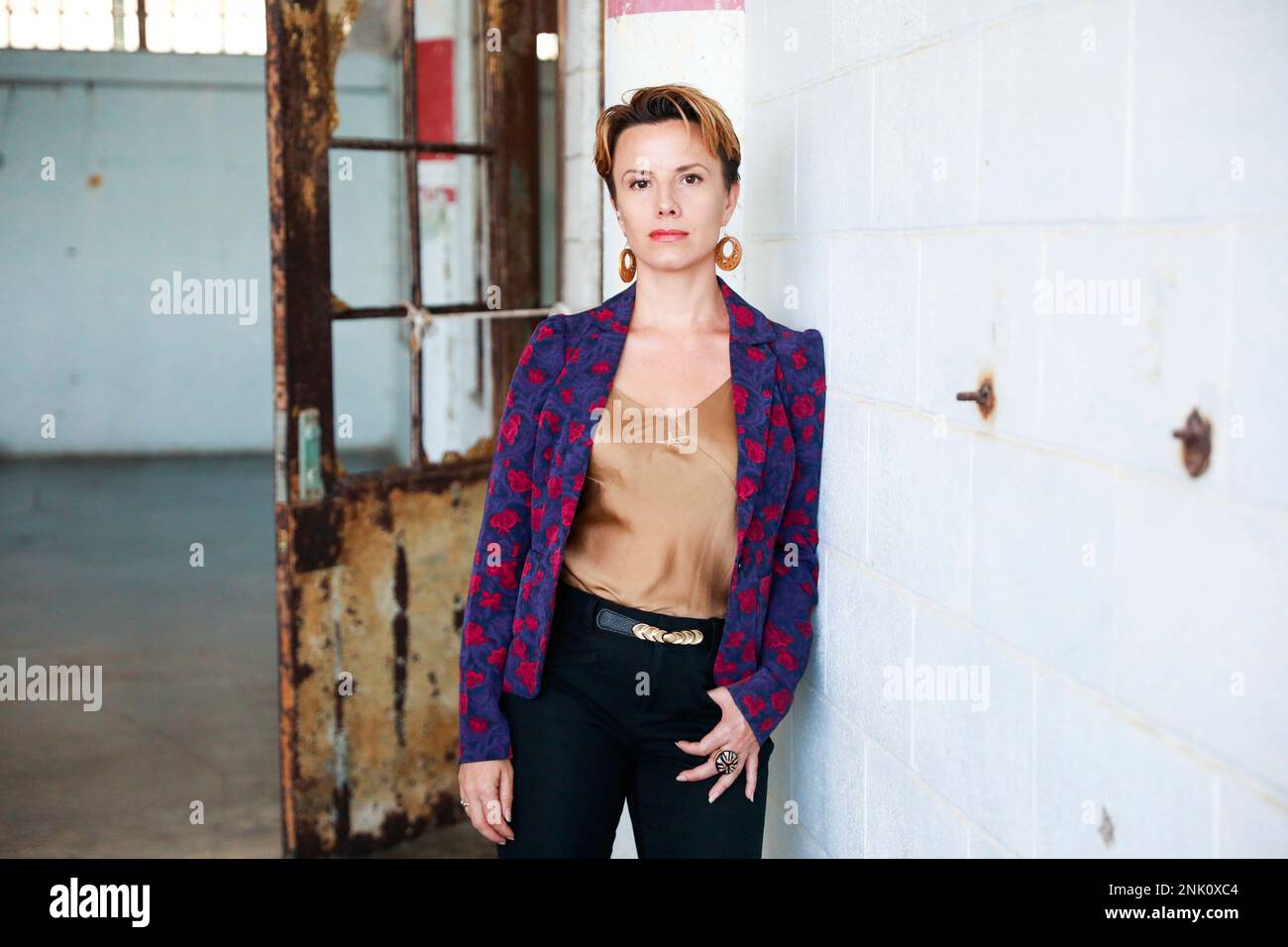 Journalist and artist Sarah Shourd stands for a portrait in a building ...