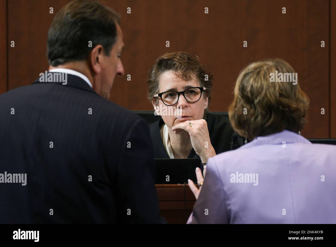 Judge Penney Azcarate talks to attorneys at the Fairfax County Circuit ...