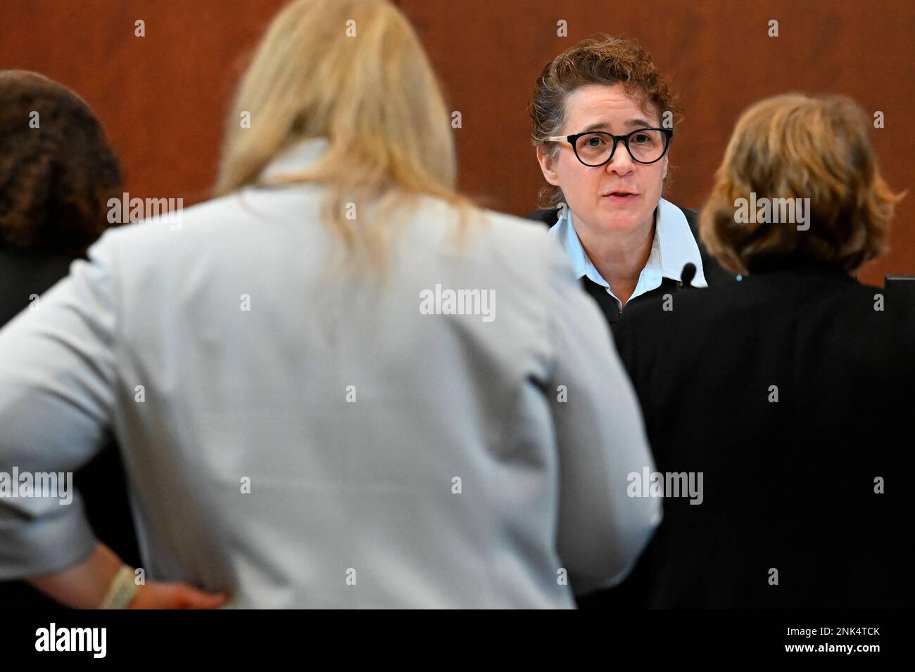 Judge Penney Azcarate speaks to attorneys in the courtroom at the ...