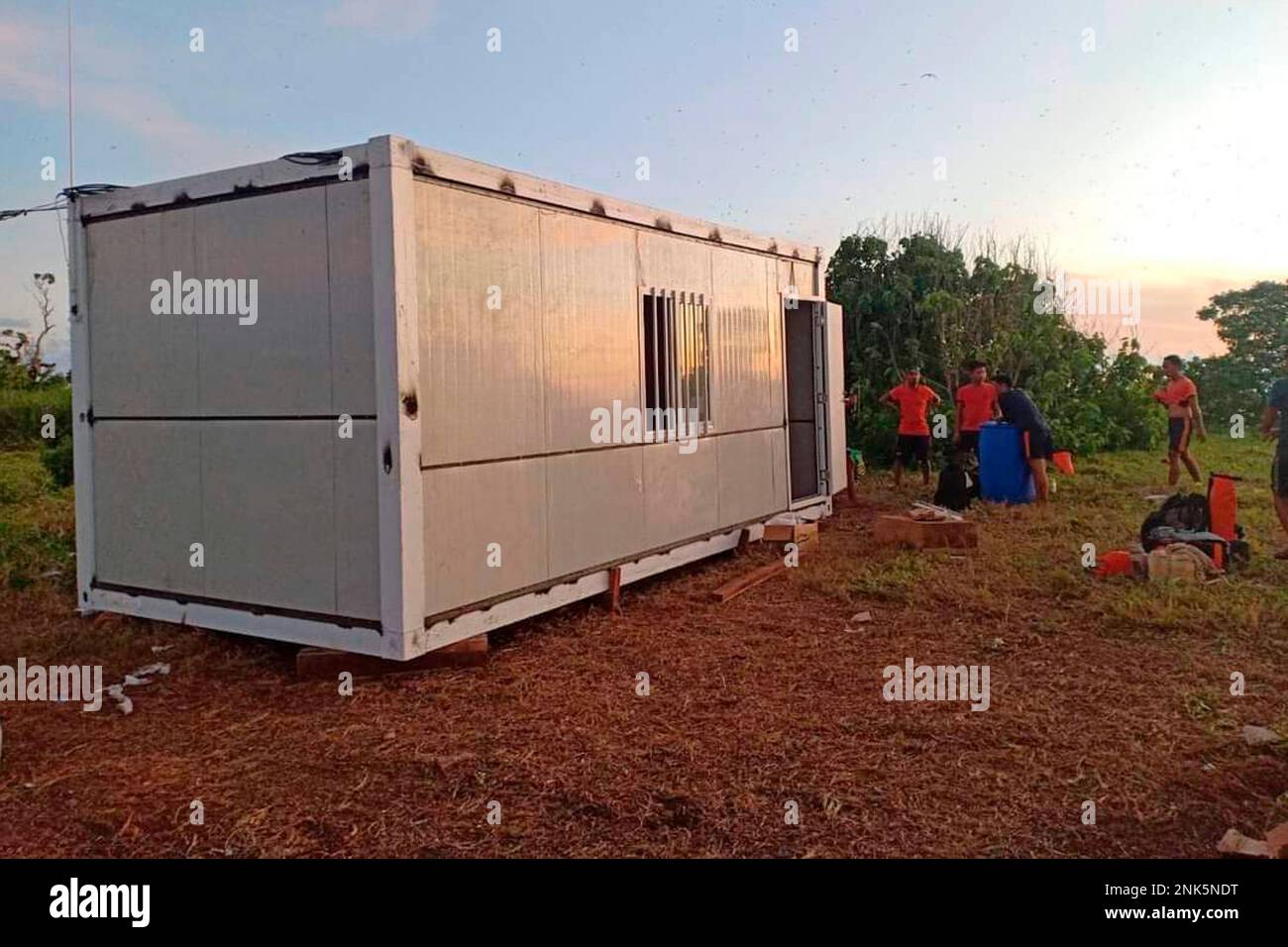 In this photo provided by the Philippine Coast Guard, Coast Guard ...