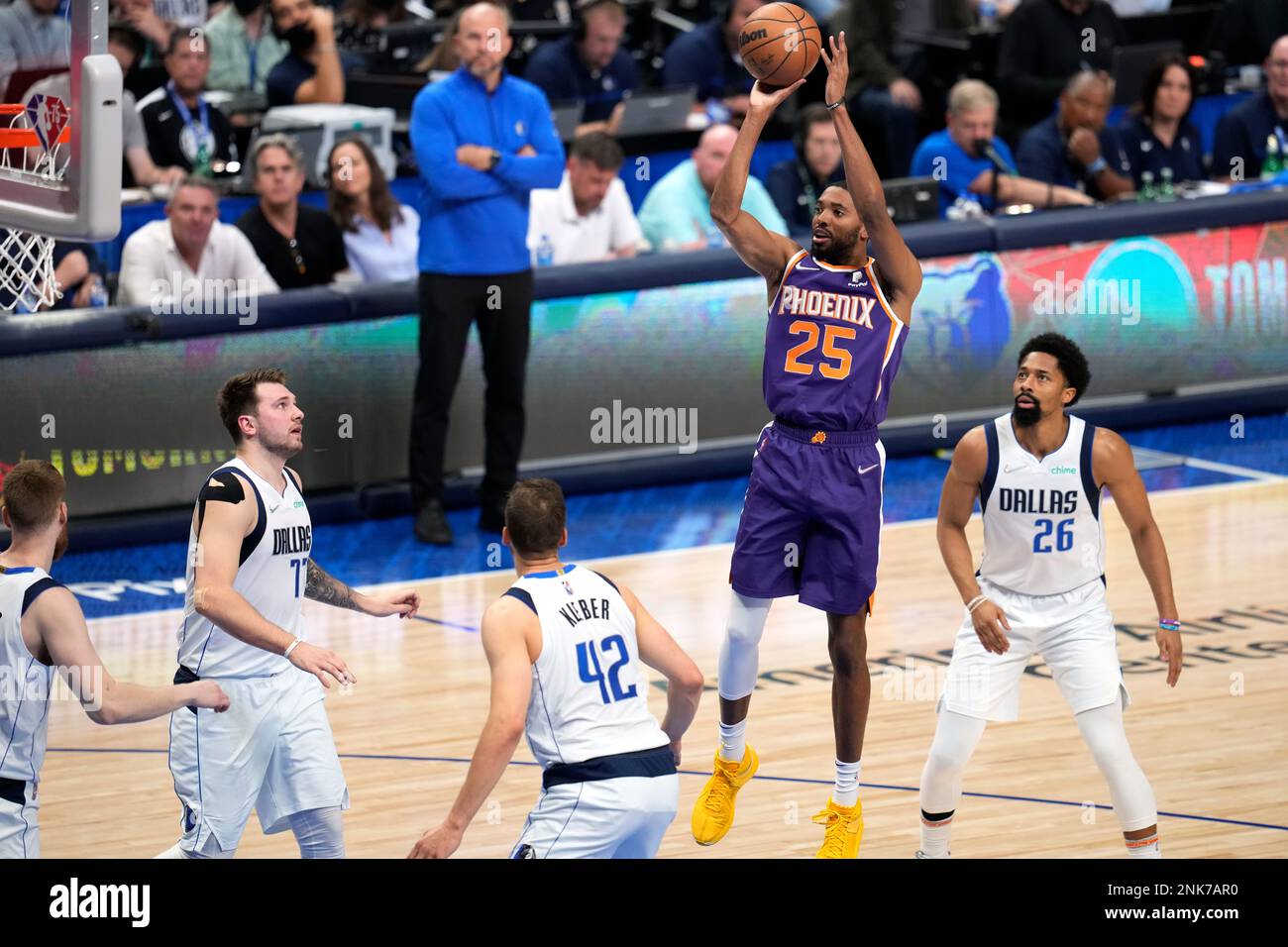 Phoenix Suns forward Mikal Bridges (25) takes a shot attempt over ...