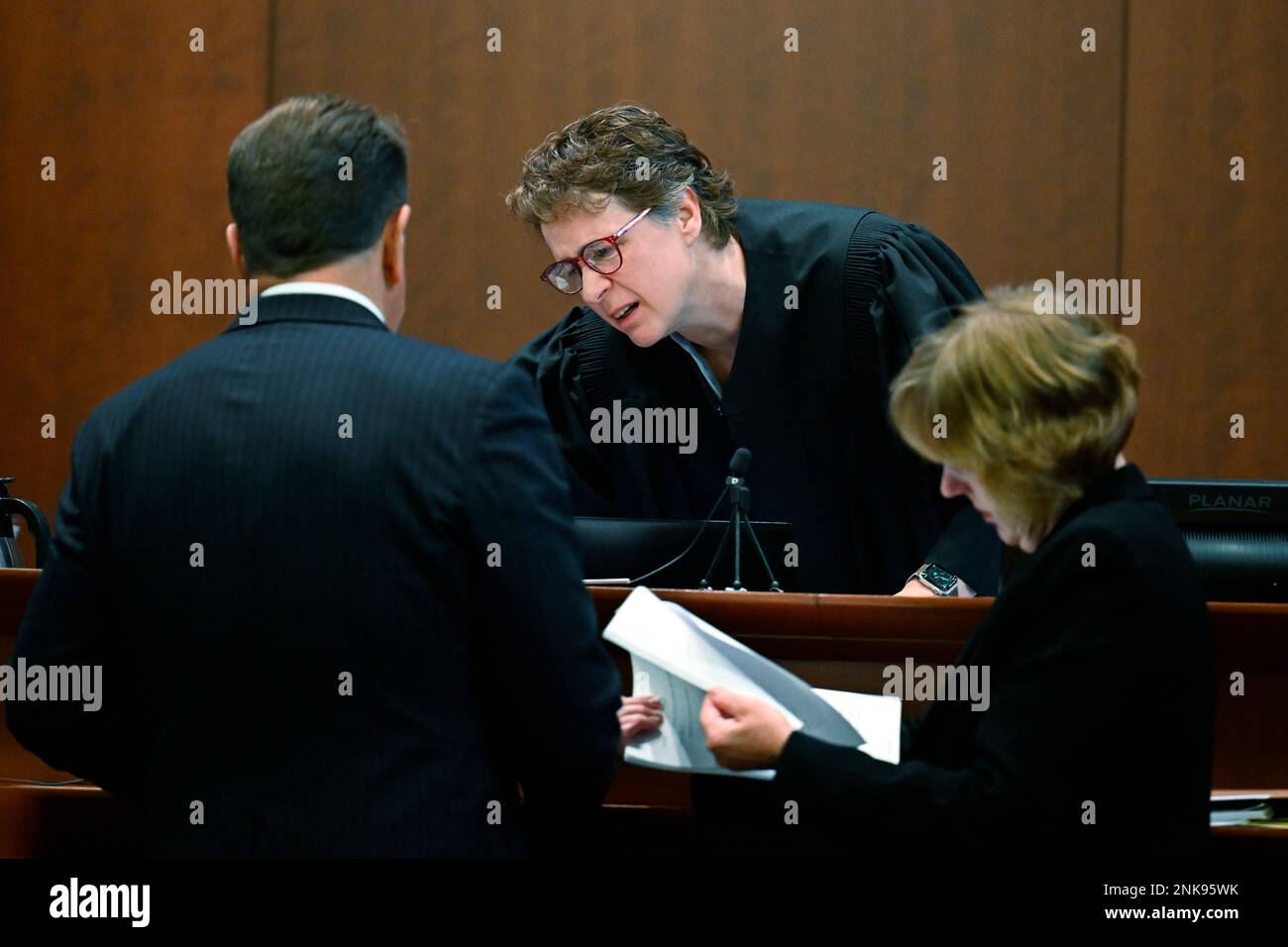 Judge Penney Azcarate speaks to the attorneys in the courtroom at the ...