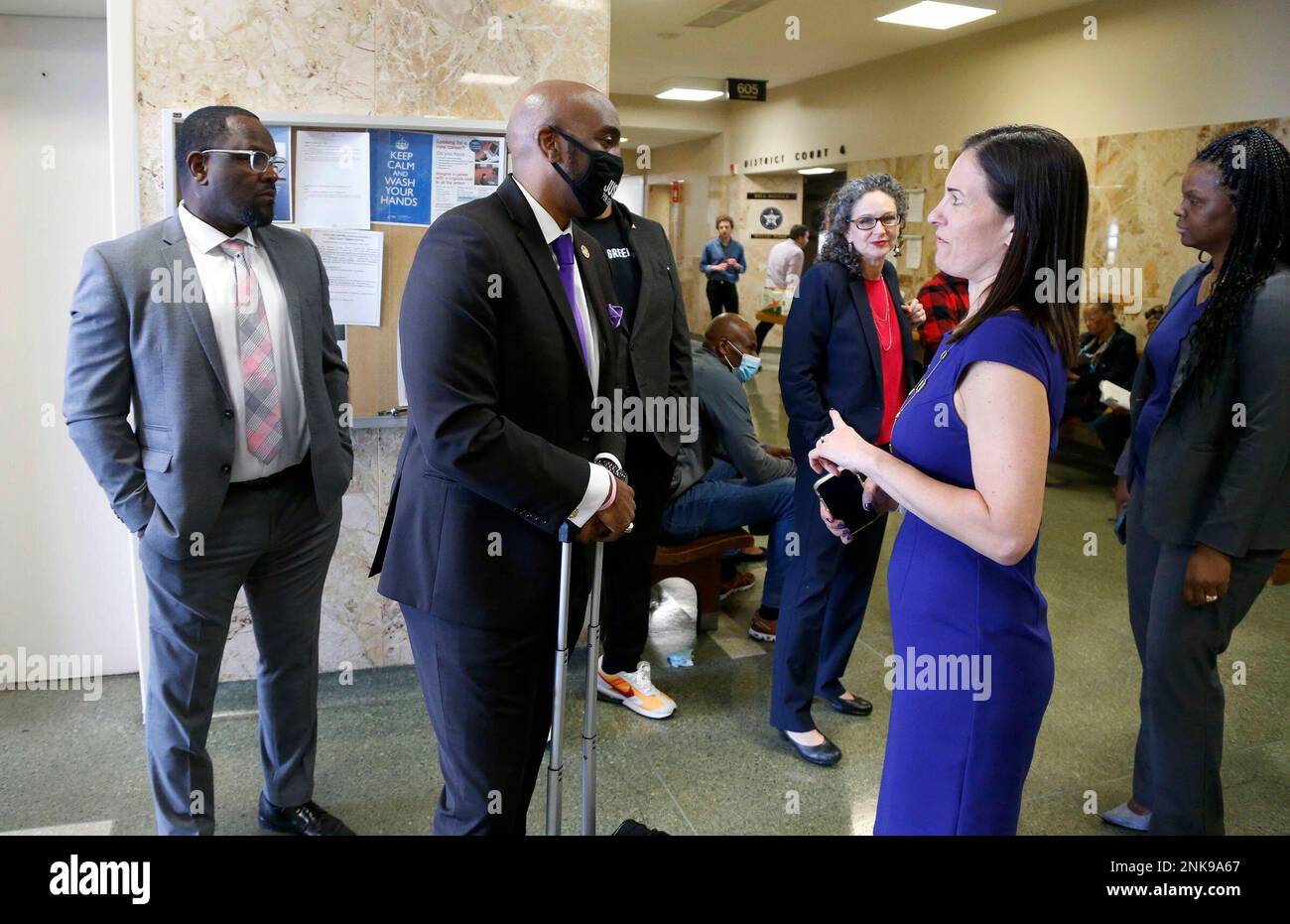 Attorney Damario Solomon Simmons, center, attends a hearing at the ...