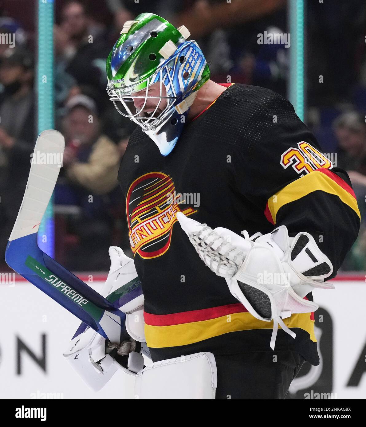 Vancouver Canucks goalie Spencer Martin celebrates after the team's 5-2 ...