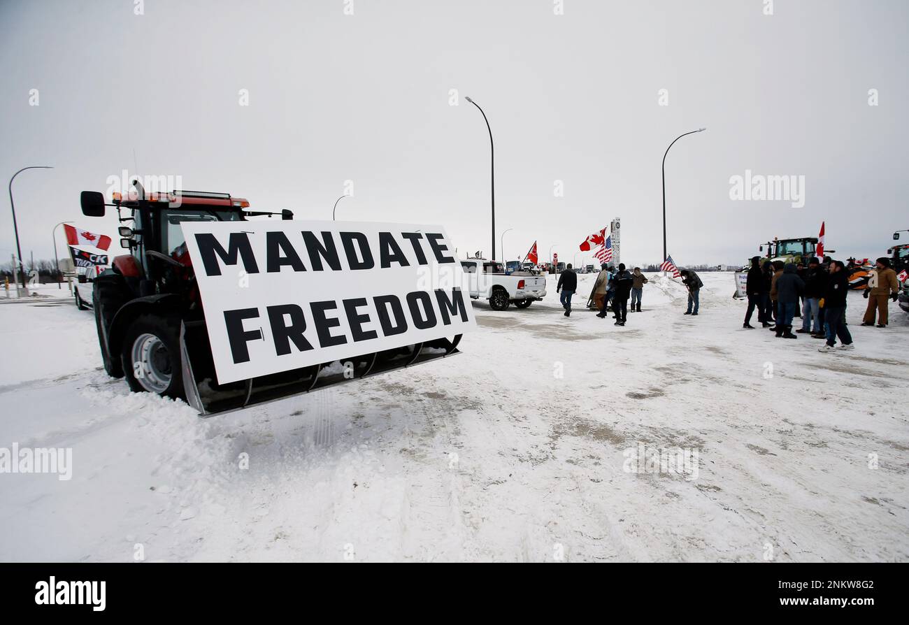 People block highway 75 with heavy trucks and farm equipment and access ...