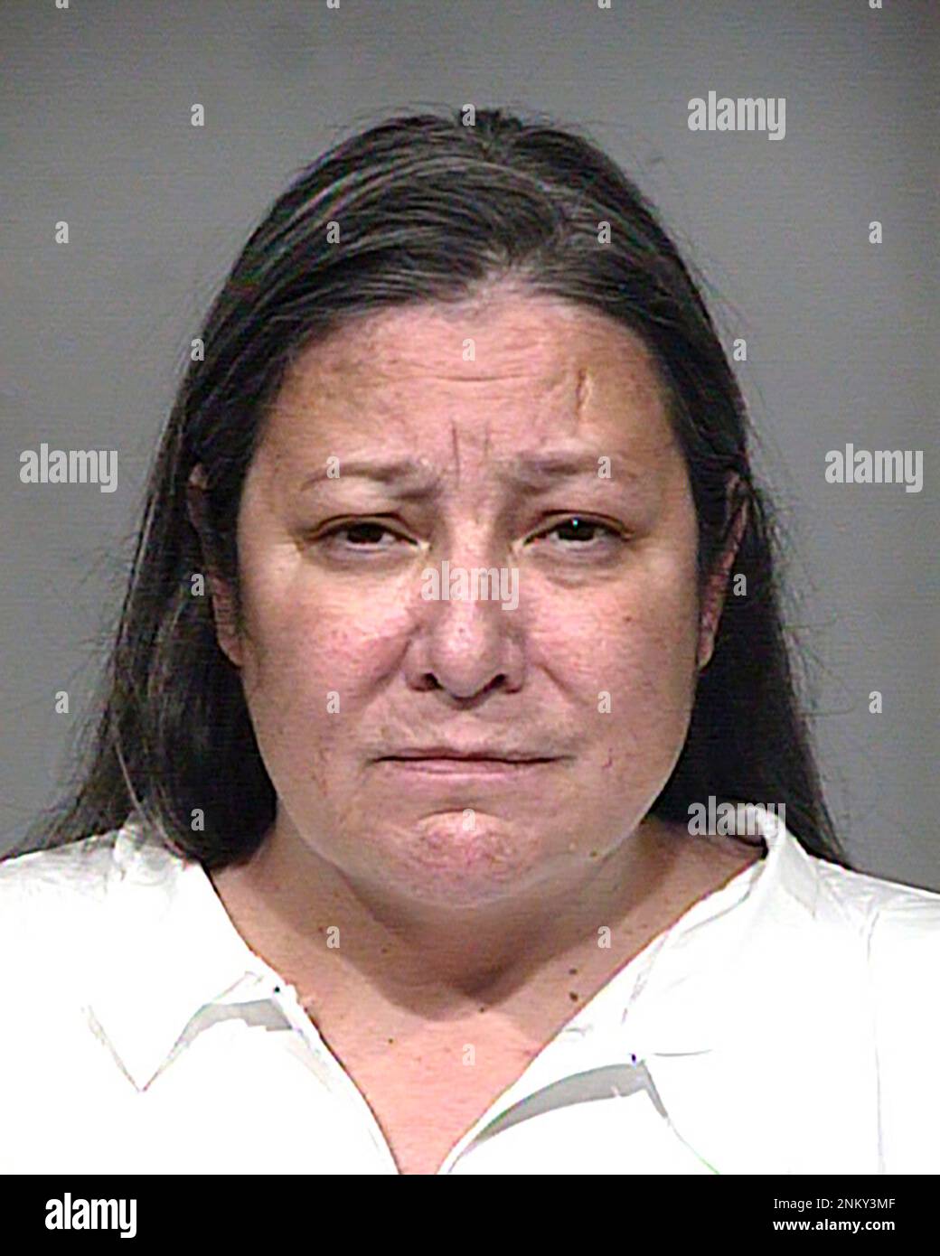 This undated Scottsdale Police Department booking image shows suspect Stephanie Marie Davis in ...