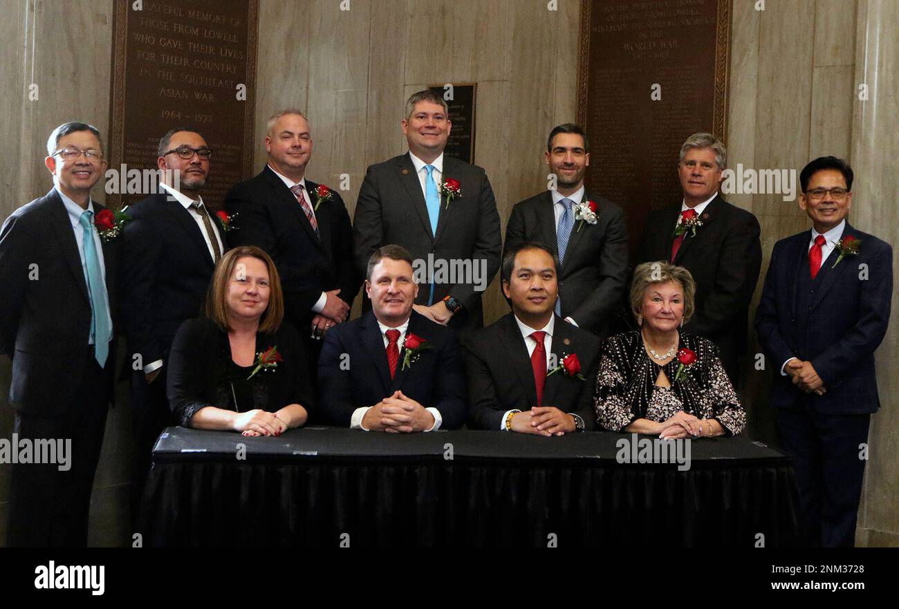 Mayor Sokhary Chau, front row, second from right, poses with other ...
