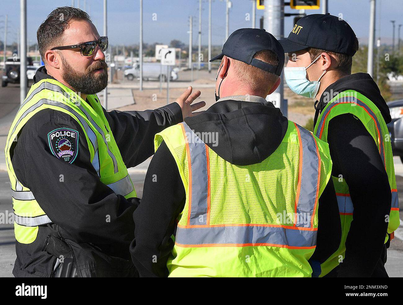 Yuma Police Department officer Richard Kral, left, an academy ...