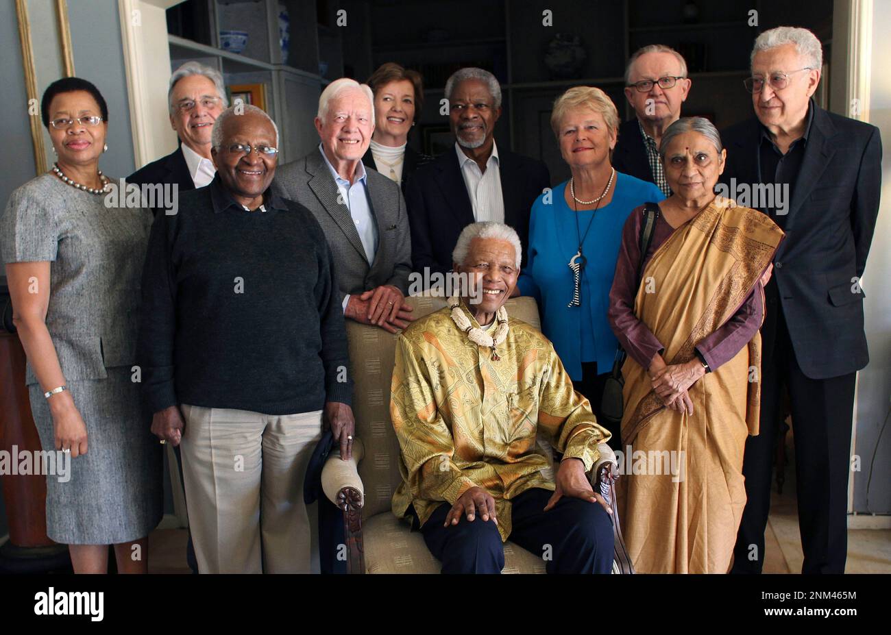 FILE - Former South Africa president Nelson Mandela, center, is ...