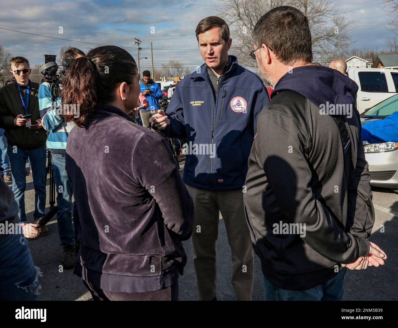 Kentucky Gov. Andy Beshear, center, talks with Bremen, Ky., Mayor Allen ...