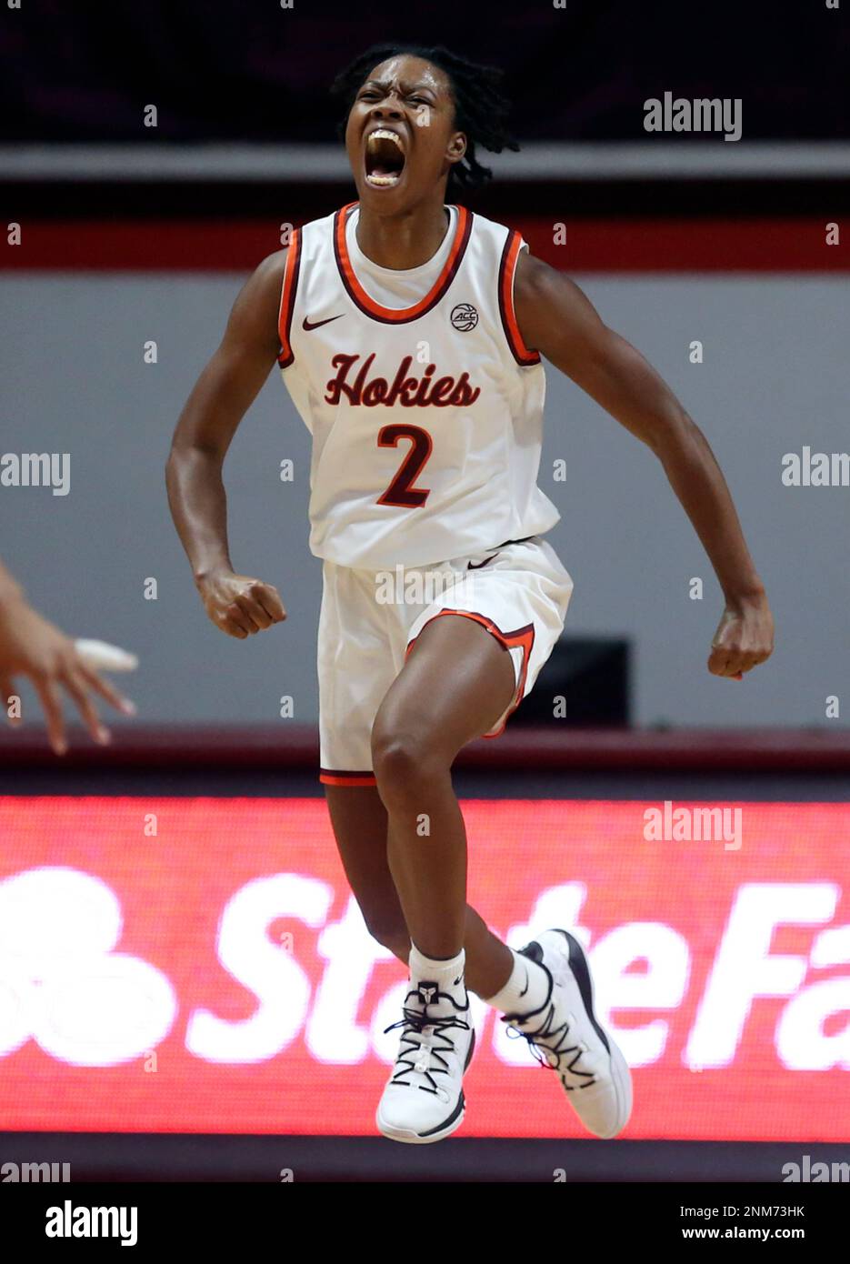 Virginia Tech's Aisha Sheppard (2) celebrates a turnover and a score ...