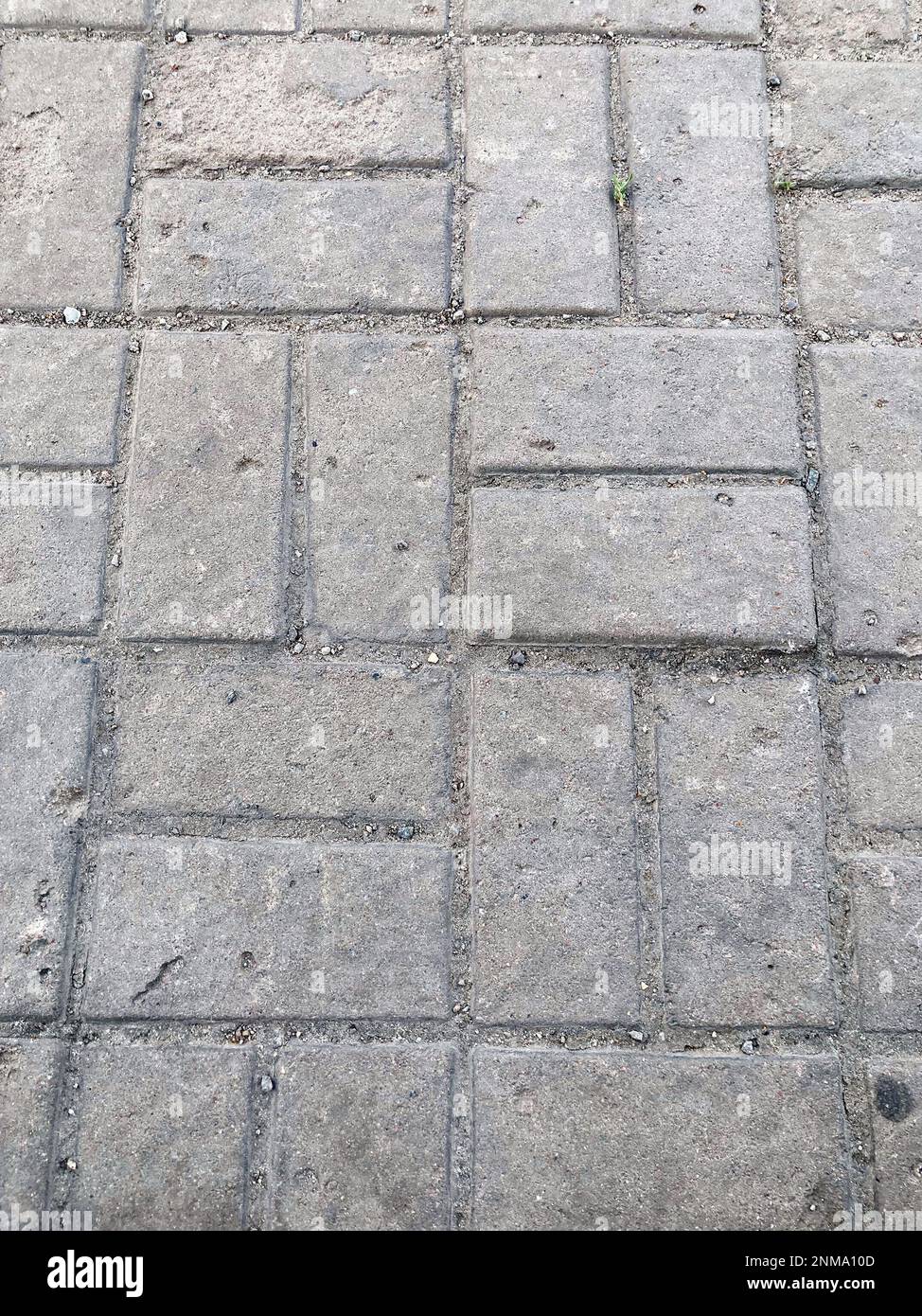 La texture de la tuile pavée au fond de la rue. Fond de sol en pierre ...