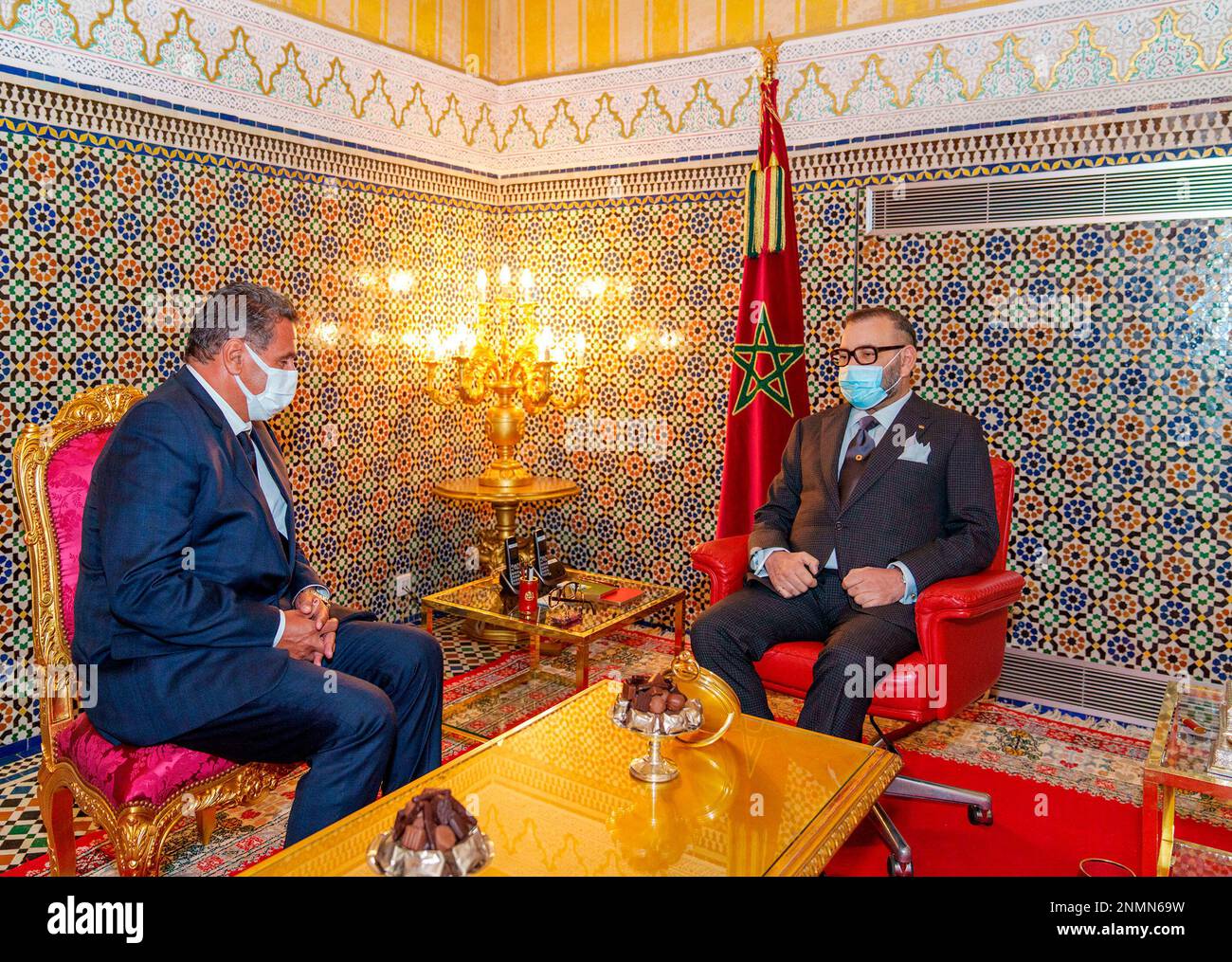 In this photo released by the Royal Palace, Morocco's King Mohammed VI, right, receives Aziz ...