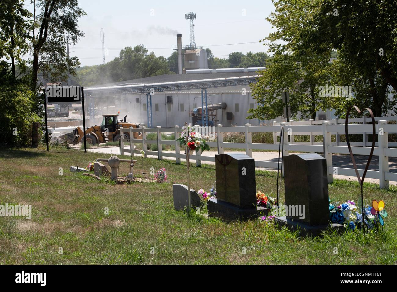 A front end loader operates just outside the entrance to the Woodbury ...