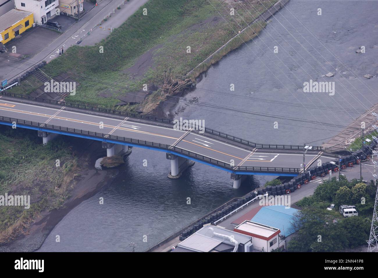 An aerial photo shows Kisegawa Ohashi bridge whose pier broken due to ...