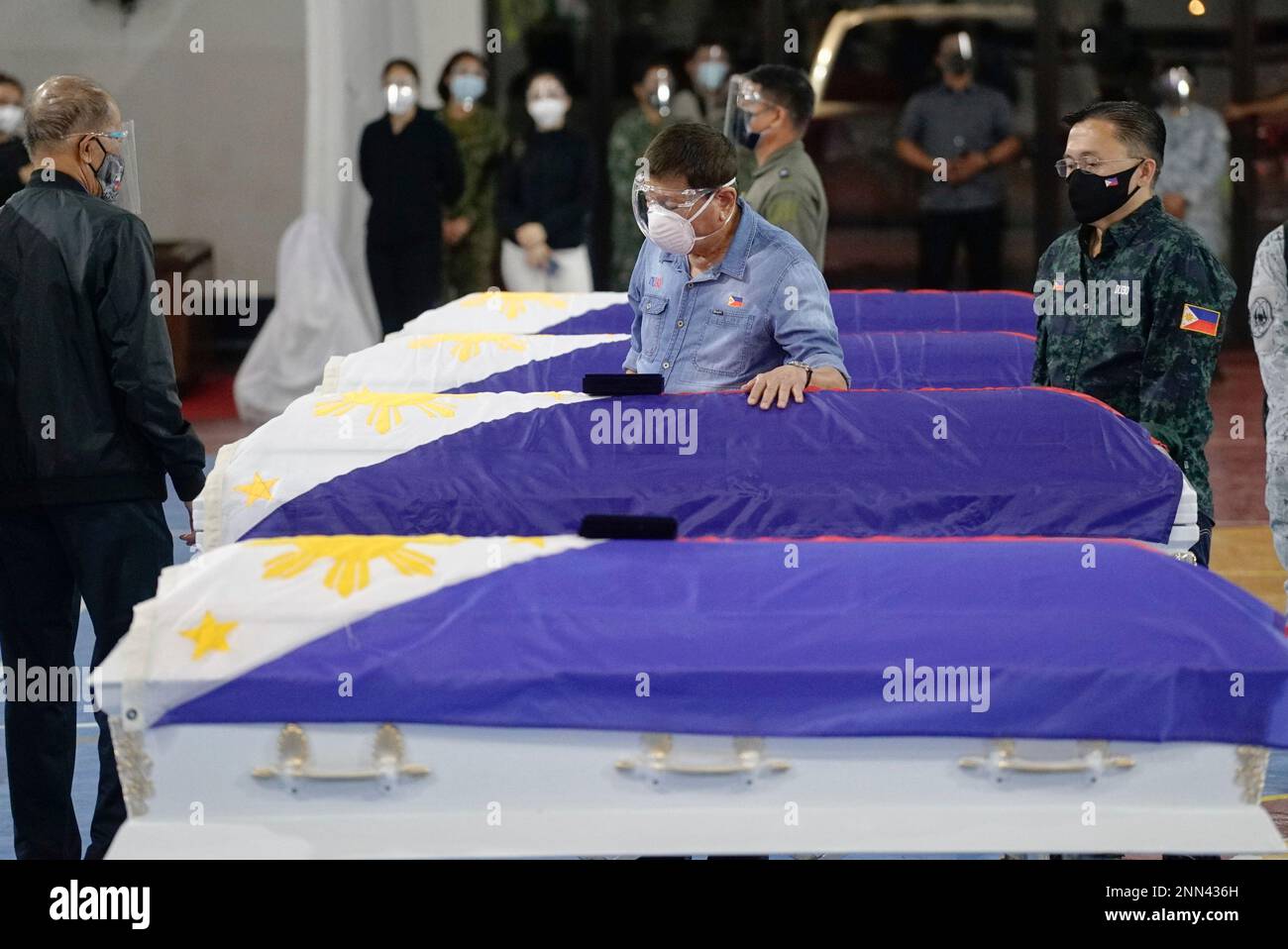 In this handout photo provided by the Malacanang Presidential ...