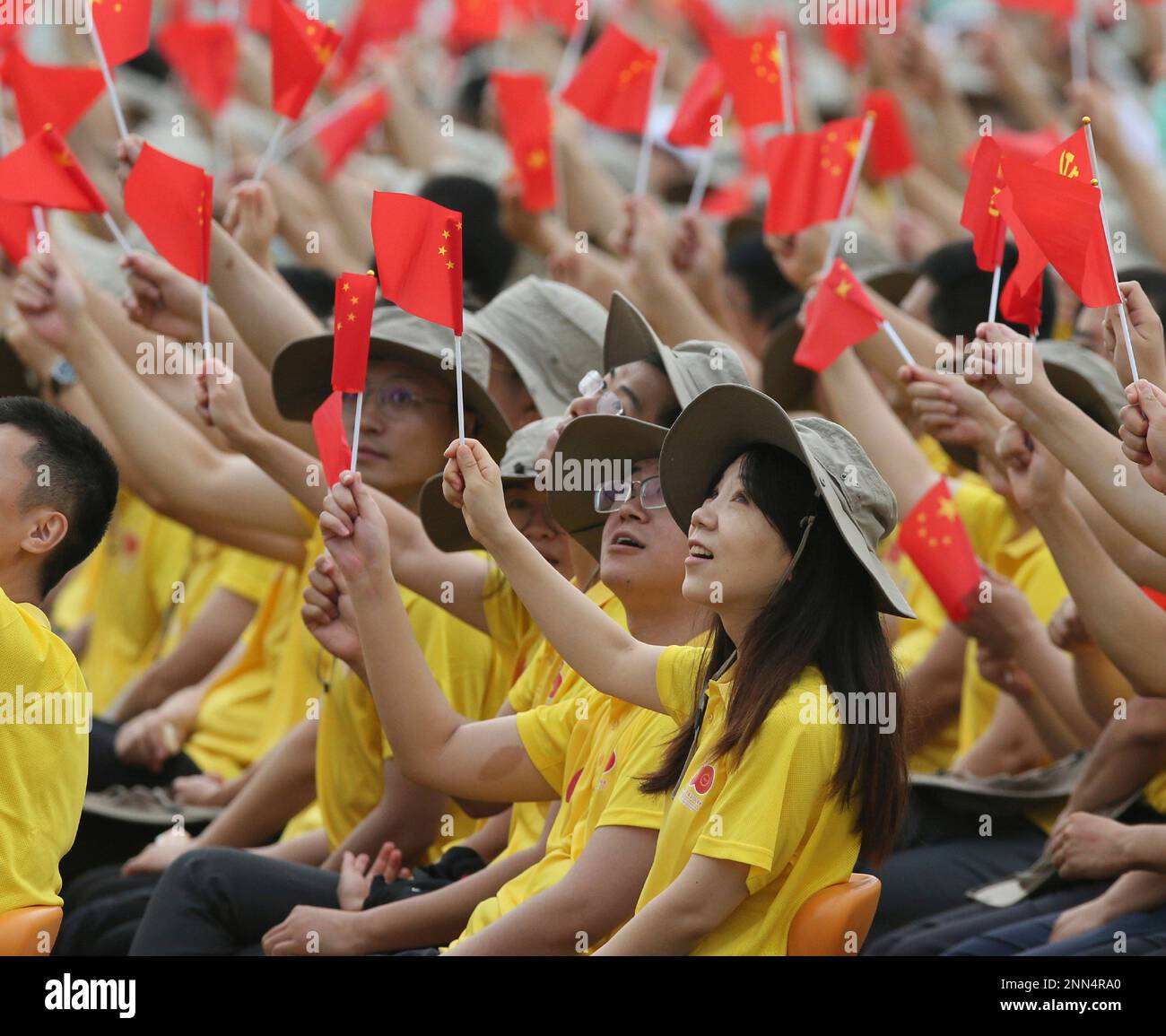 People attend a ceremony to commemorate the 100th anniversary of the ...