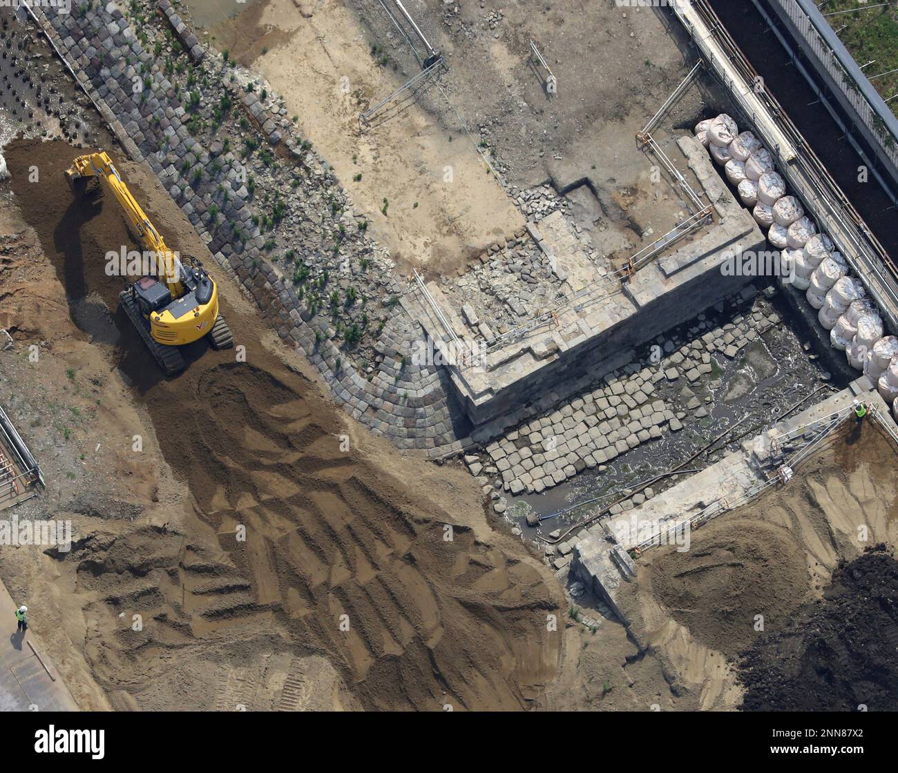 An aerial photo shows Takanawa Chikutei, the remains of Japan's first ...