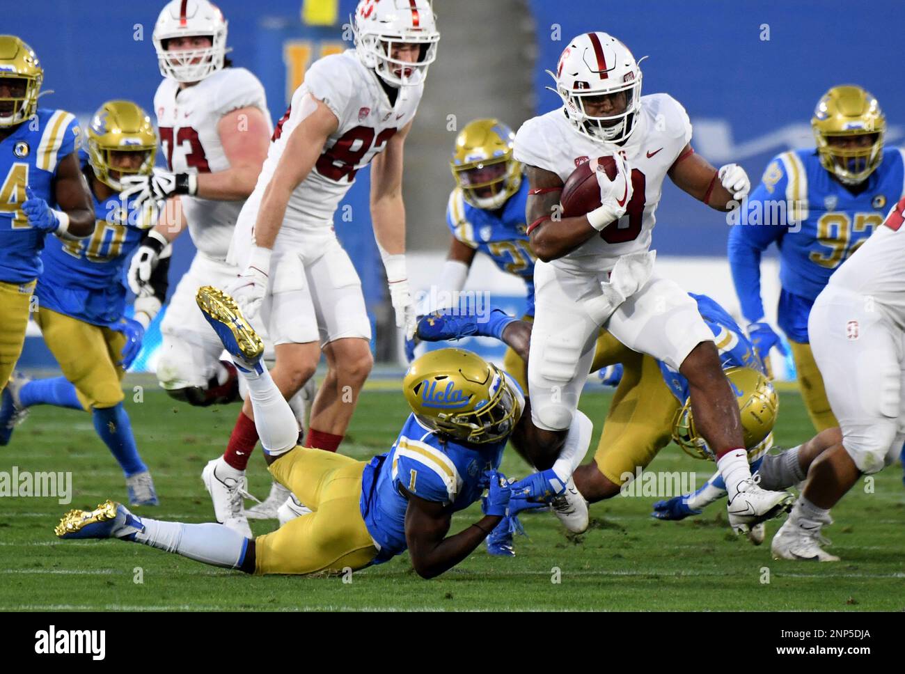 Stanford running back Nathaniel Peat (8) runs for a first down against ...