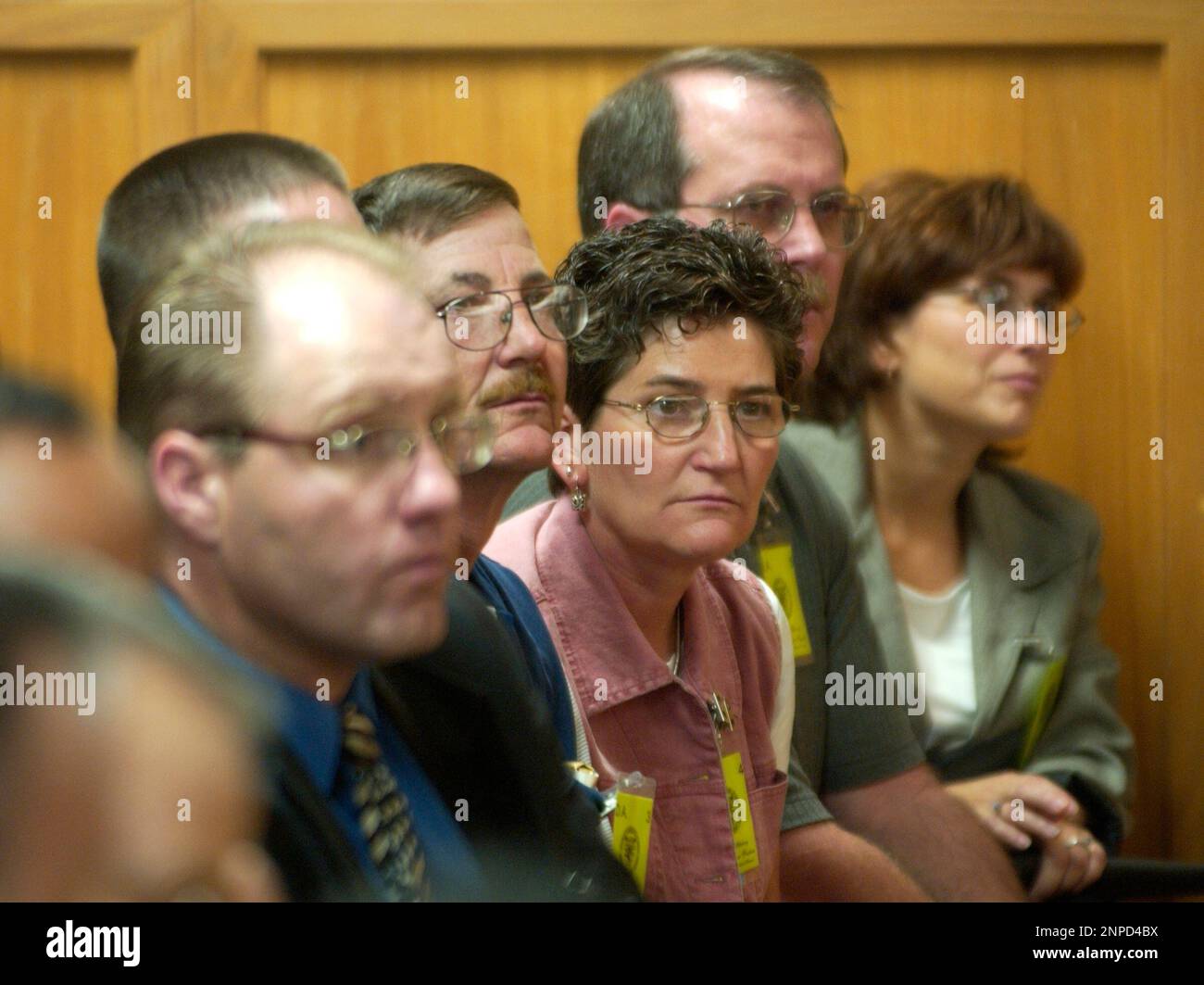 Beverly Plapp, center, looks over a Dennis Rader as he makes a final ...