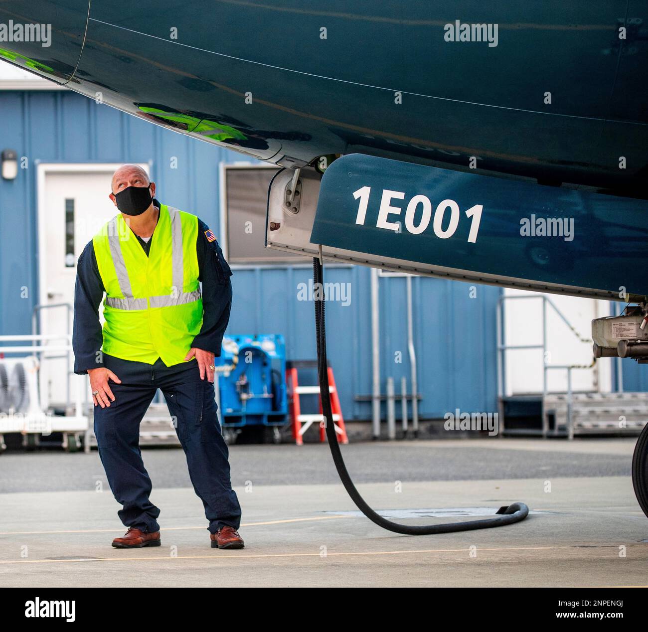 FAA chief Steve Dickson walks around a Boeing 737 MAX, conducting a pre ...
