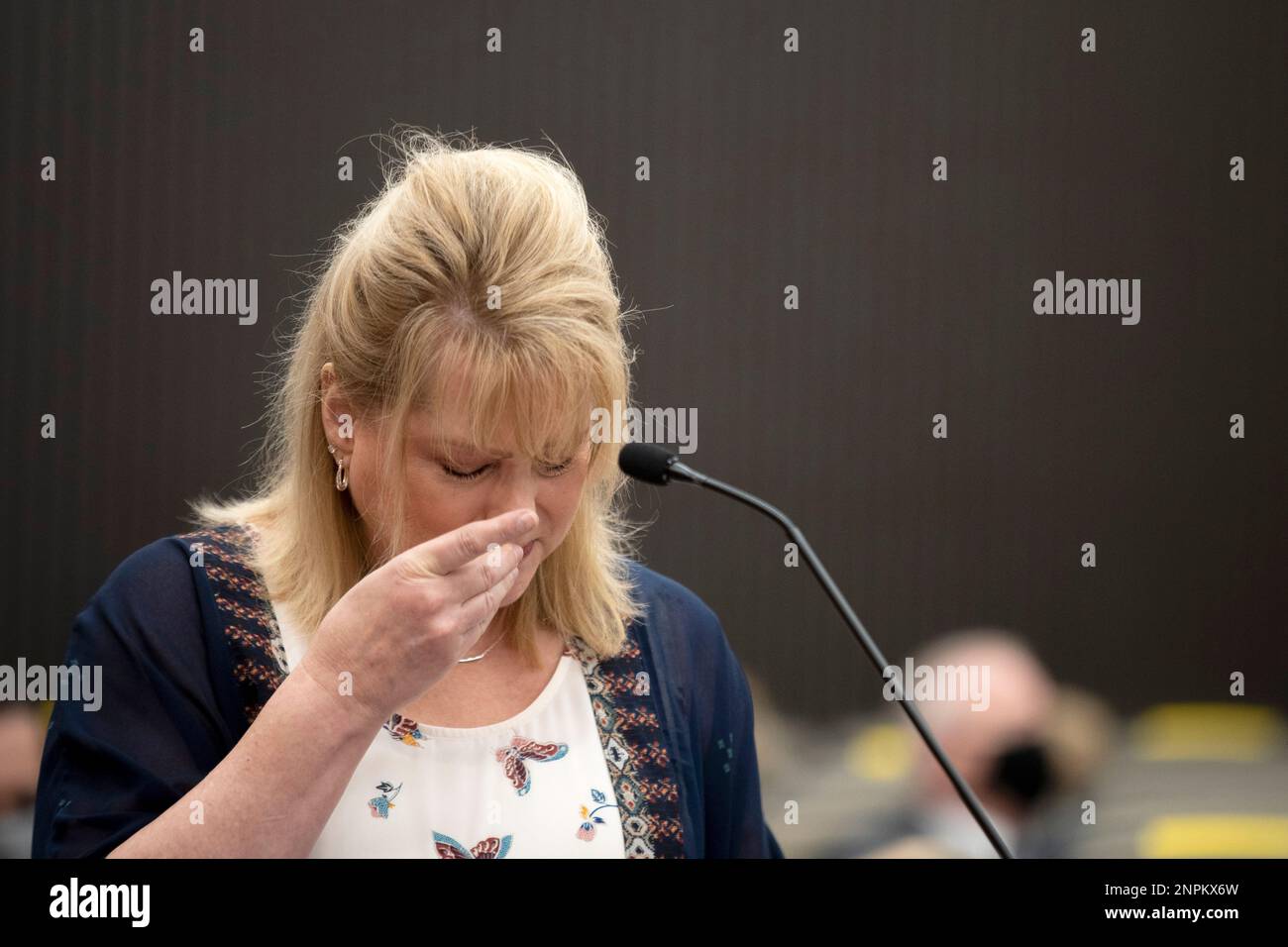 Elizabeth Hupp, daughter of Claude Snelling, makes a statement as ...
