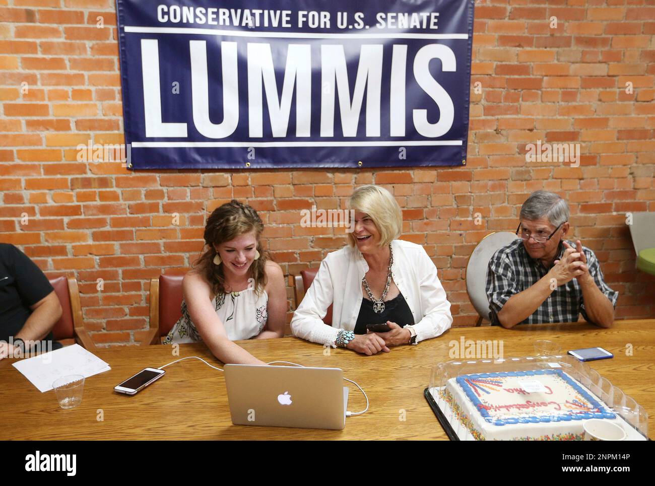 U.S. Senate candidate Cynthia Lummis, center right, smiles while ...
