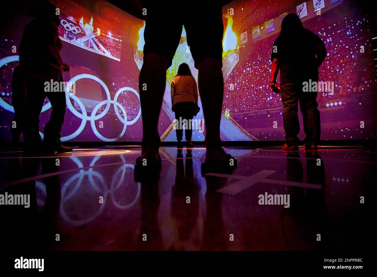 Megan Ritch, center, watches the simulation of the Parade of Nations ...