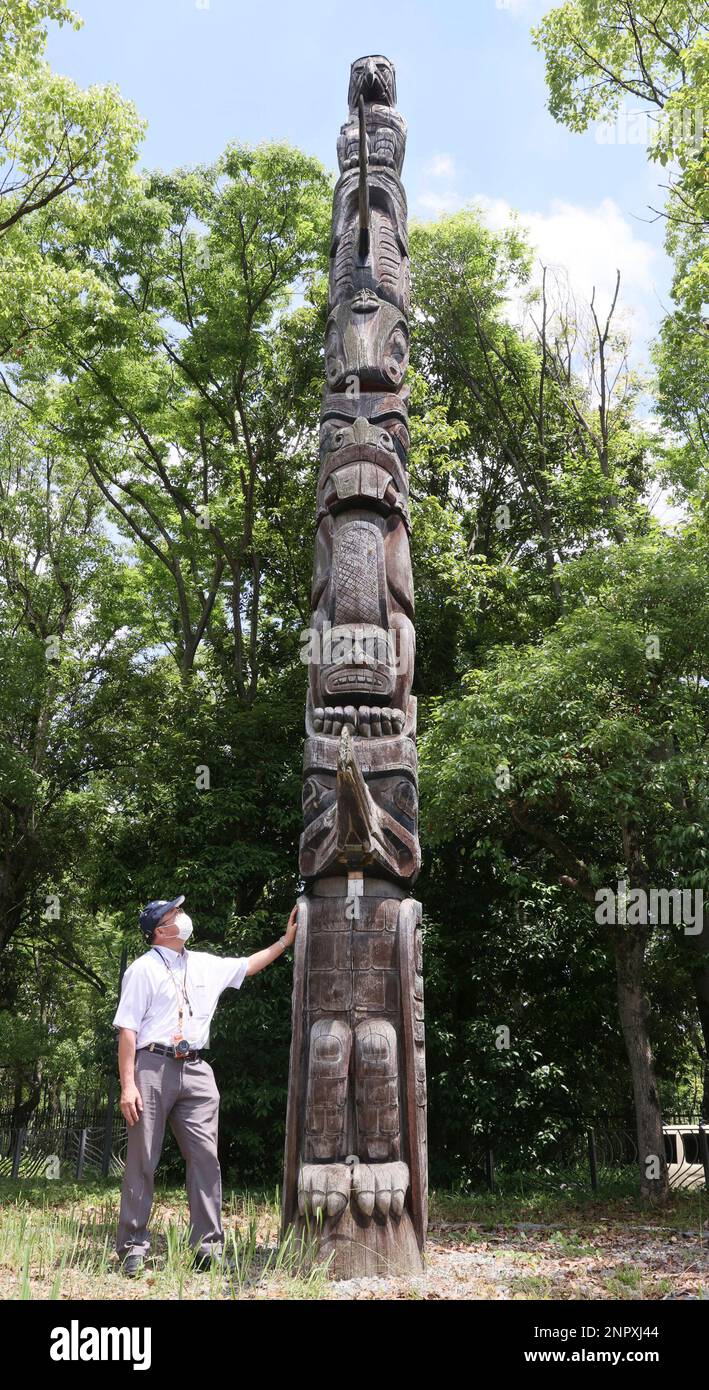 The current totem pole stands at an entrance of the National Museum of ...