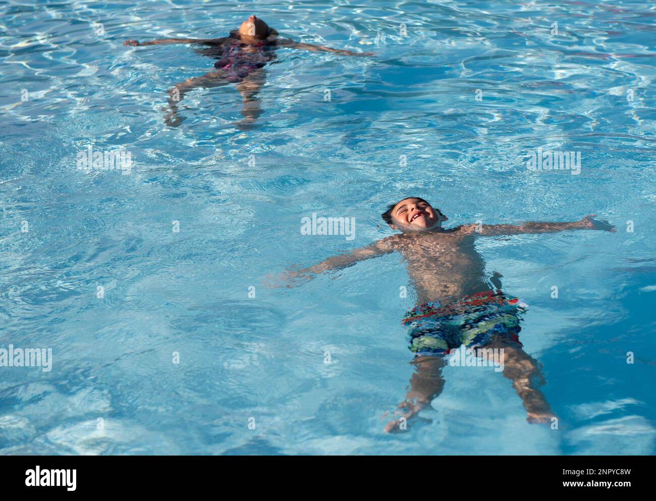 Hugo Akar, 5, and his sister Milani Akar, 6, both of Shaler, have a ...